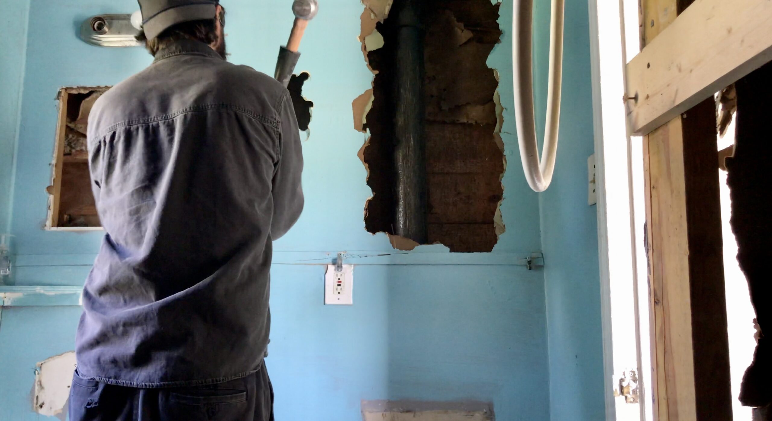 DIY Bathroom Demo to Make it Larger - Journey Down The Road