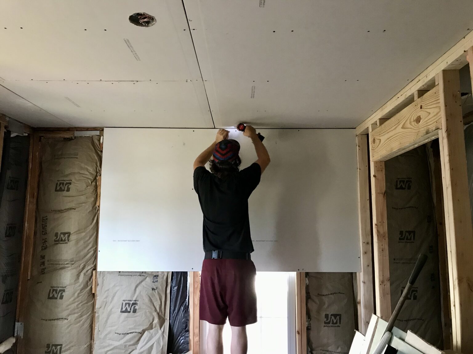 Hanging Drywall on the Office Walls Alone - Journey Down The Road